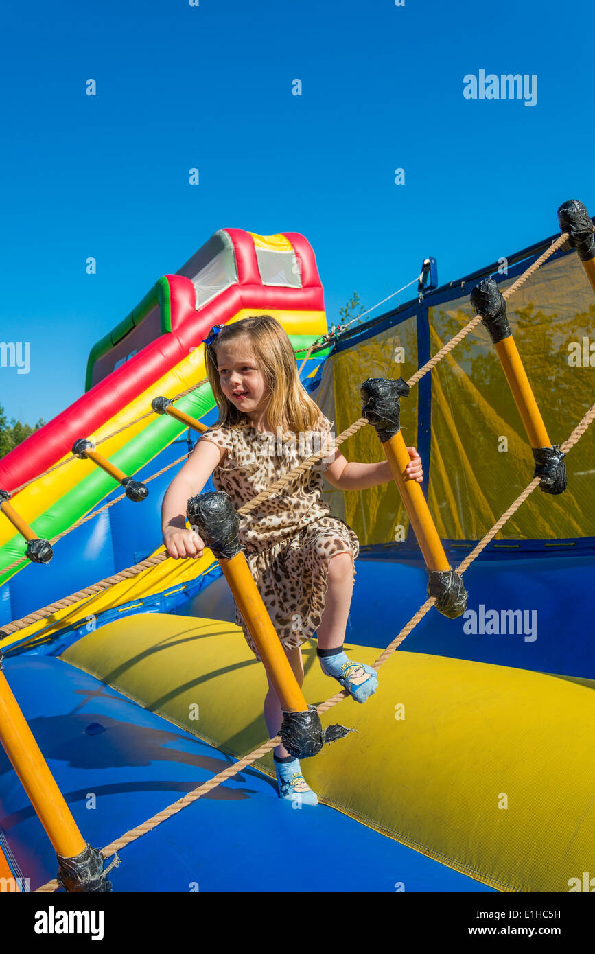 Fair game girl inflatable rope ladder hi-res stock photography and ...