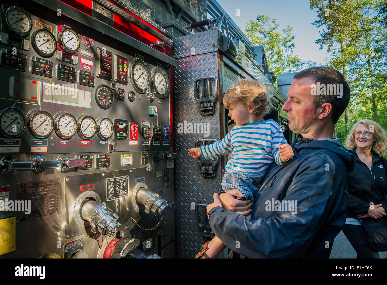 Young boy looks at Fire Truck at Spring Fair, Burnaby, British Columbia ...