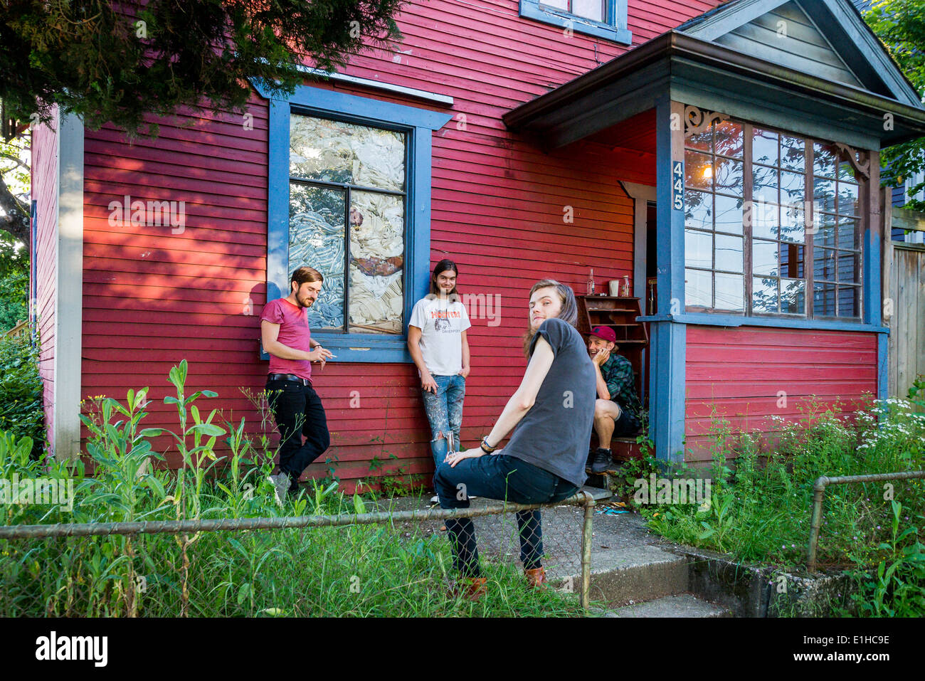 Guys hanging out in the front yard, Strathcona neighbourhood, Vancouver ...