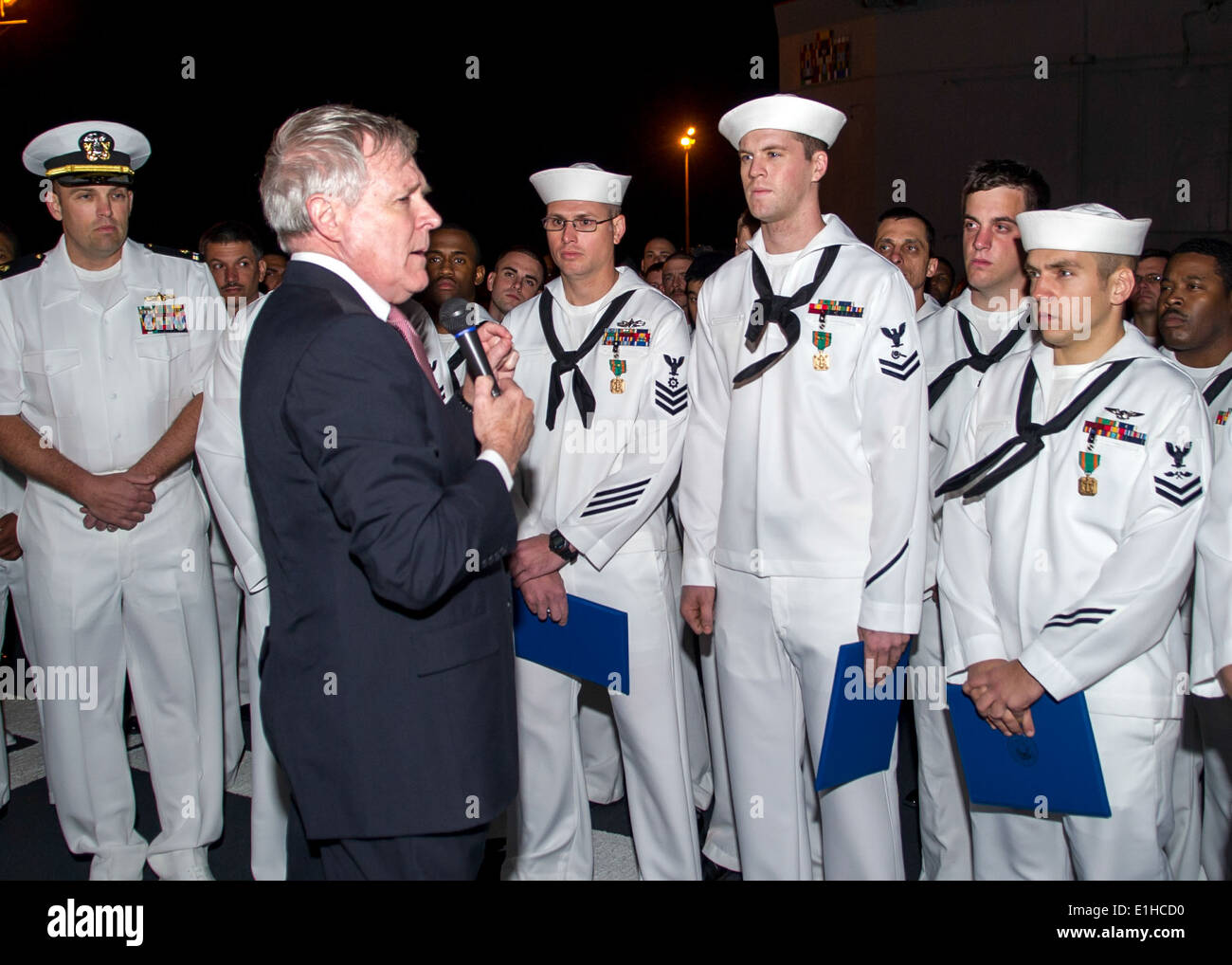 Secretary of the Navy Ray Mabus, second from left, speaks with U.S ...