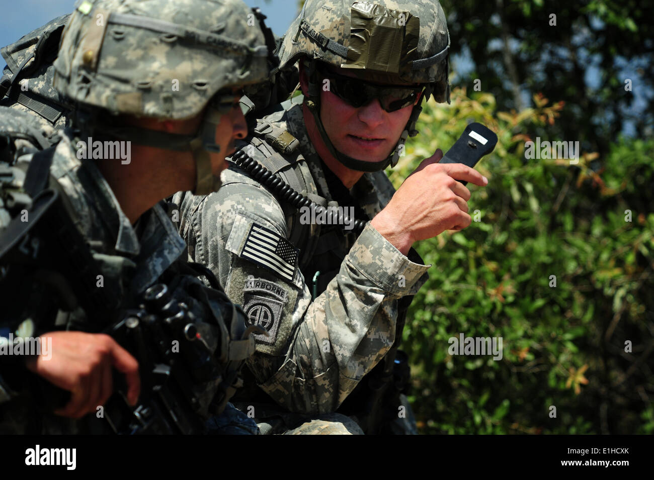 U.S. Army Staff Sgt. Steven Adams, right, with the 2nd Battalion, 325th ...