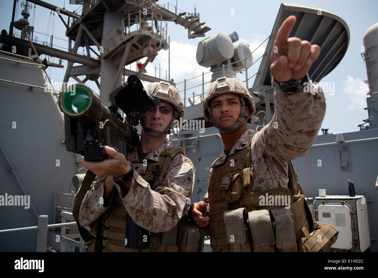 U.S. Marine Corps Cpl. Kevin A. Kohl, right, and Cpl. Mark B. Fentress ...