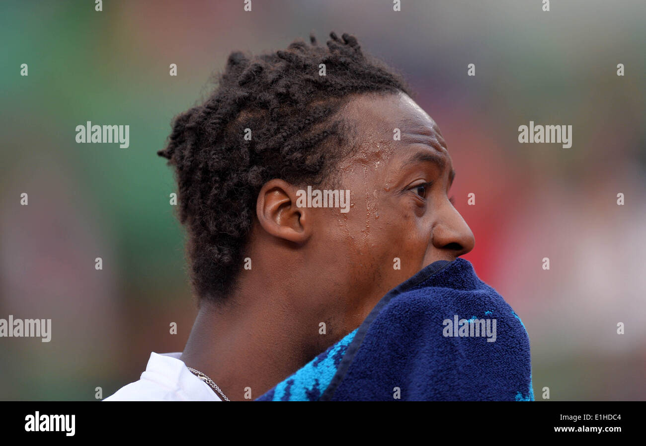 Paris, France. 4th June, 2014. France's Gael Monfils wipes sweat during ...