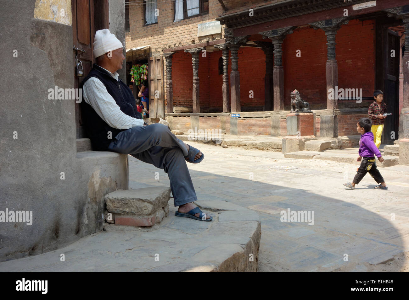 Old man resting in shade Stock Photo - Alamy