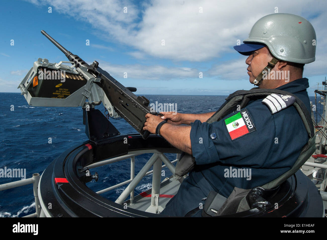 A Mexican sailor mans a .50-caliber machine gun aboard the Mexican navy ...