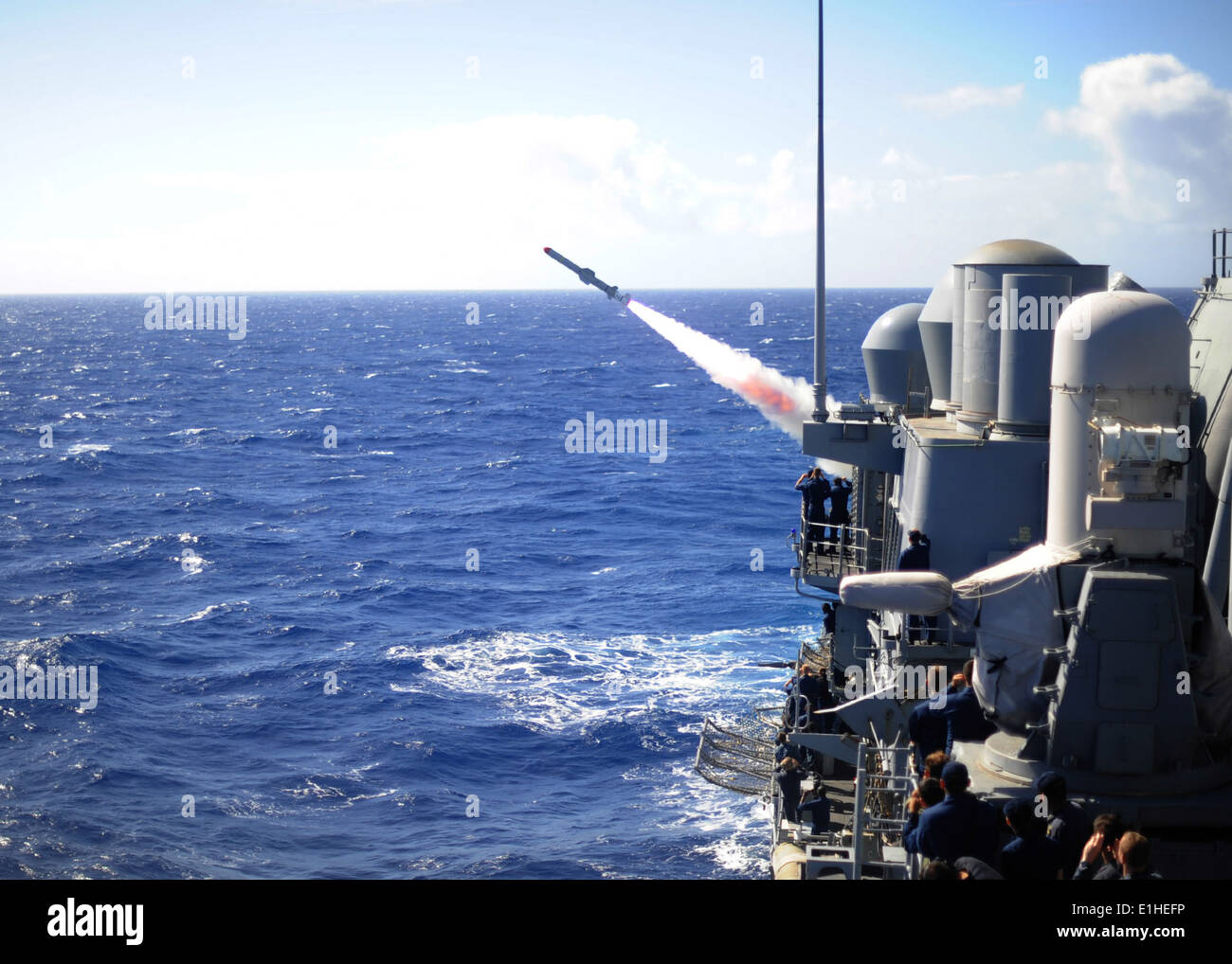 The guided missile cruiser USS Princeton (CG 59) launches a harpoon ...