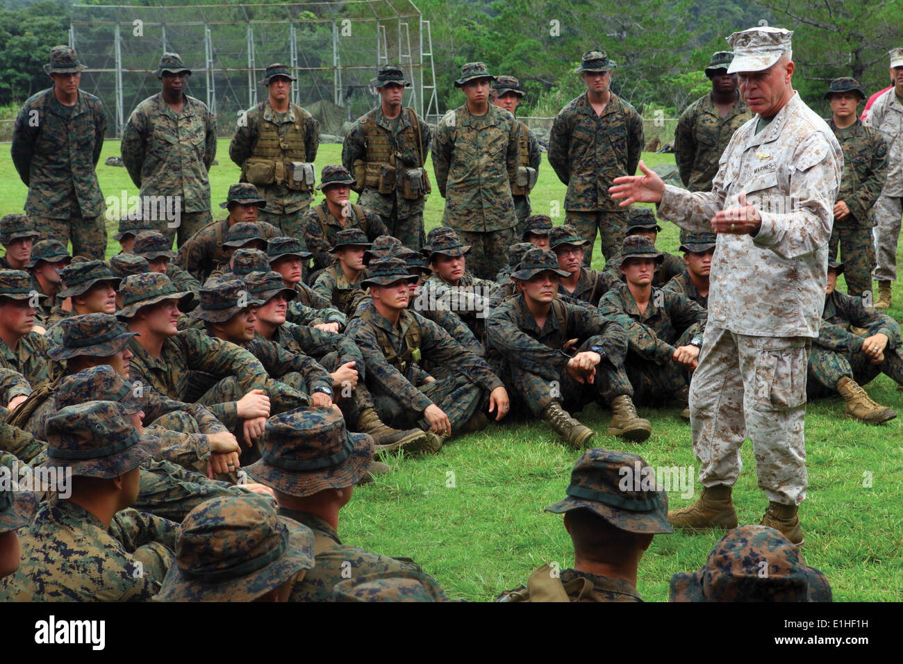 Gen. James F. Amos, the commandant of the Marine Corps, speaks to ...