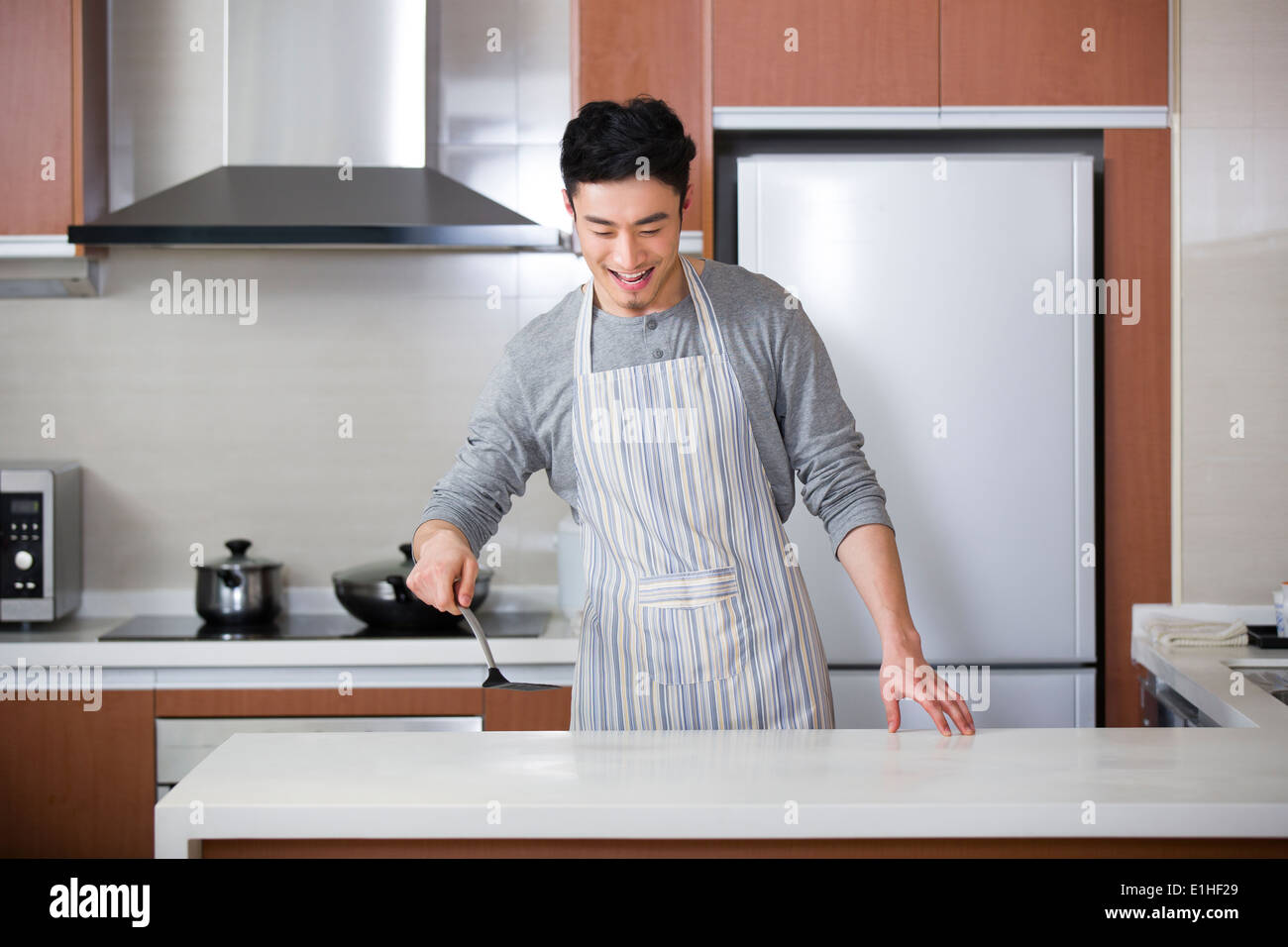 Asian men cooking hi-res stock photography and images - Alamy