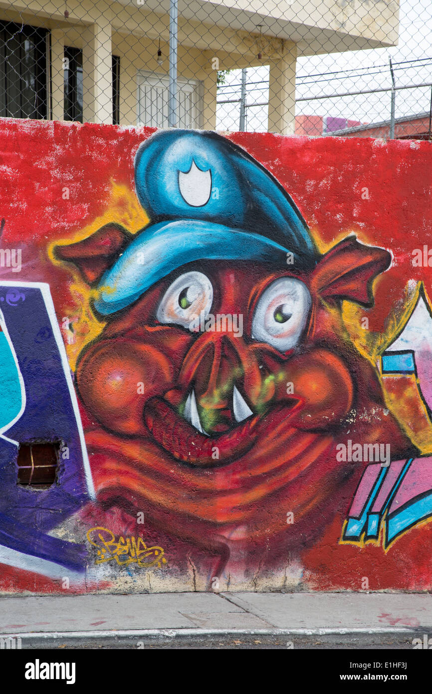 Urban art depicting a crazy hog with a hat in the Spanish colonial city ...