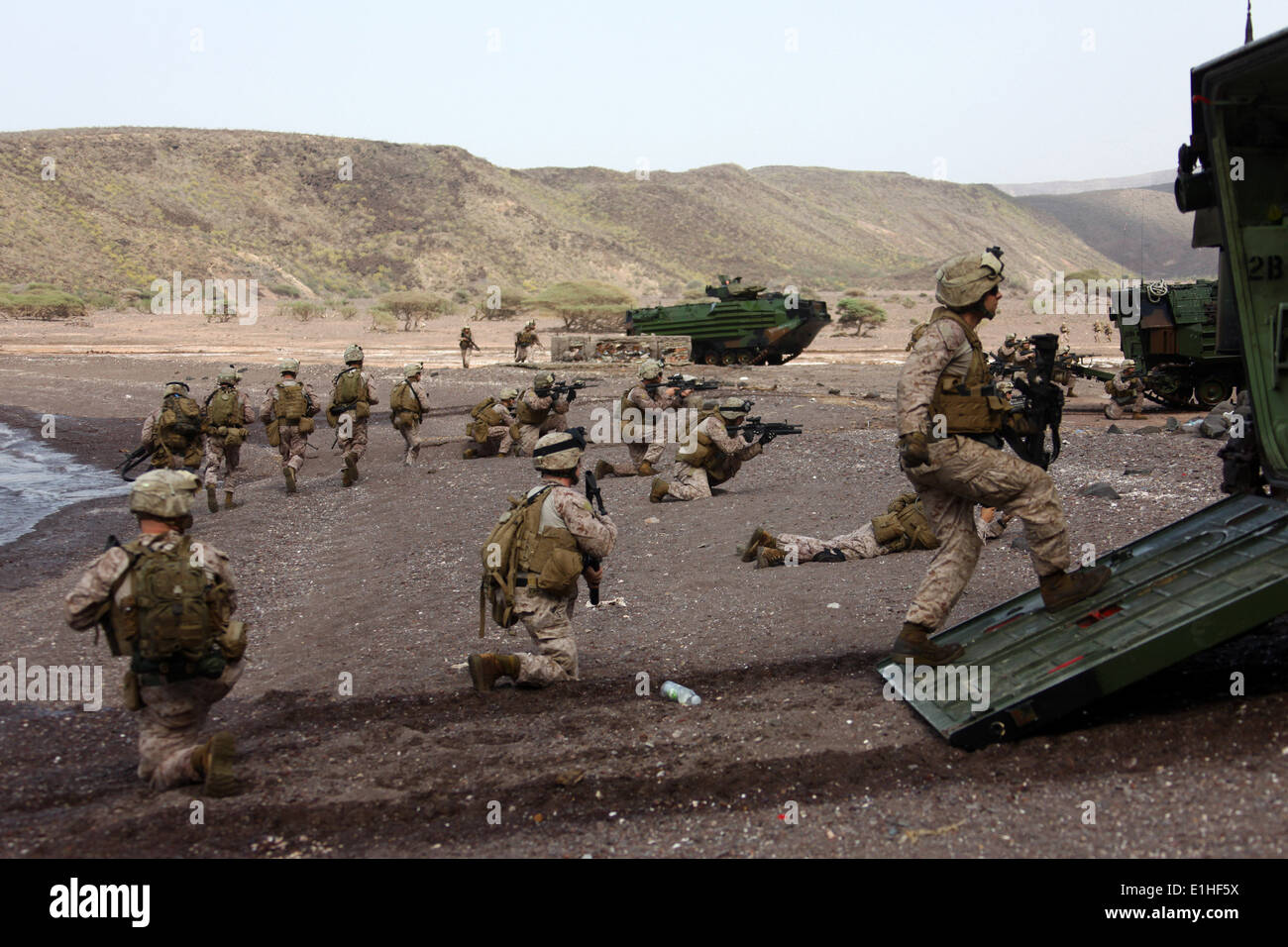 U.S. Marines with Alpha Company, Battalion Landing Team 1st Battalion ...