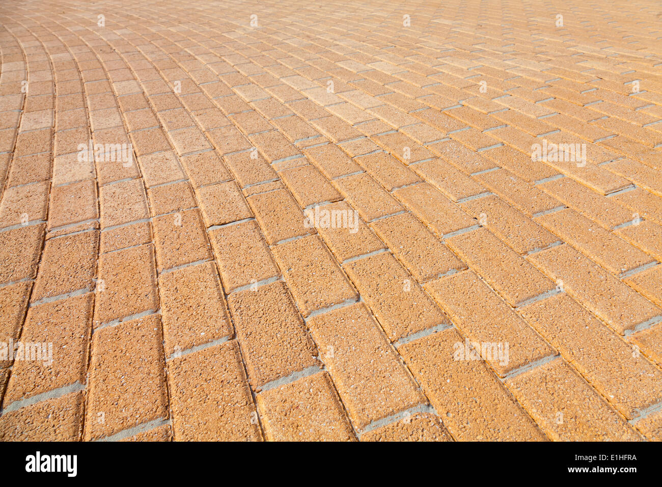Background texture of urban yellow cobblestone pavement Stock Photo - Alamy