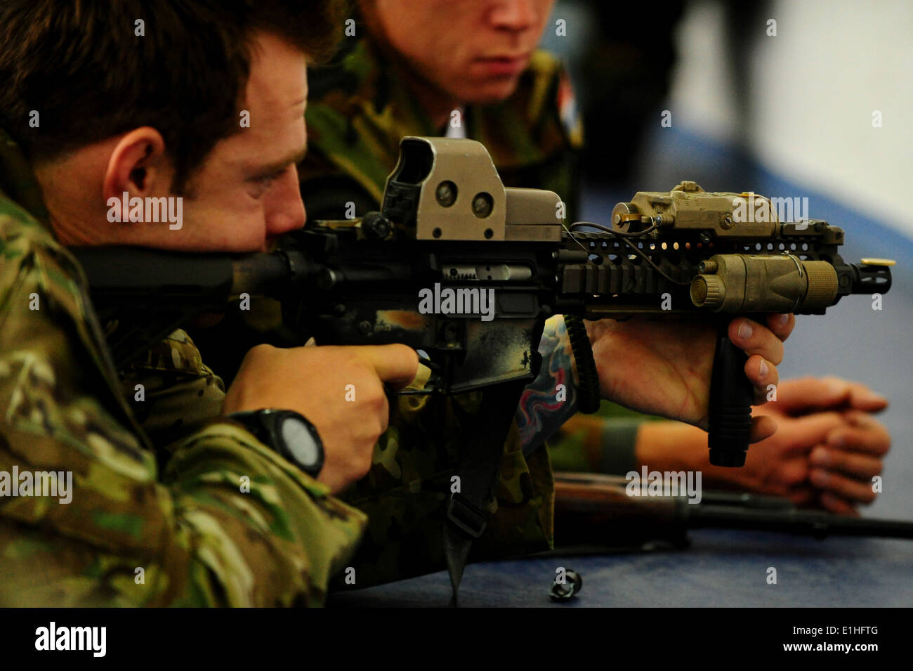 A Croatian soldier learns basic rifle marksmanship techniques during ...