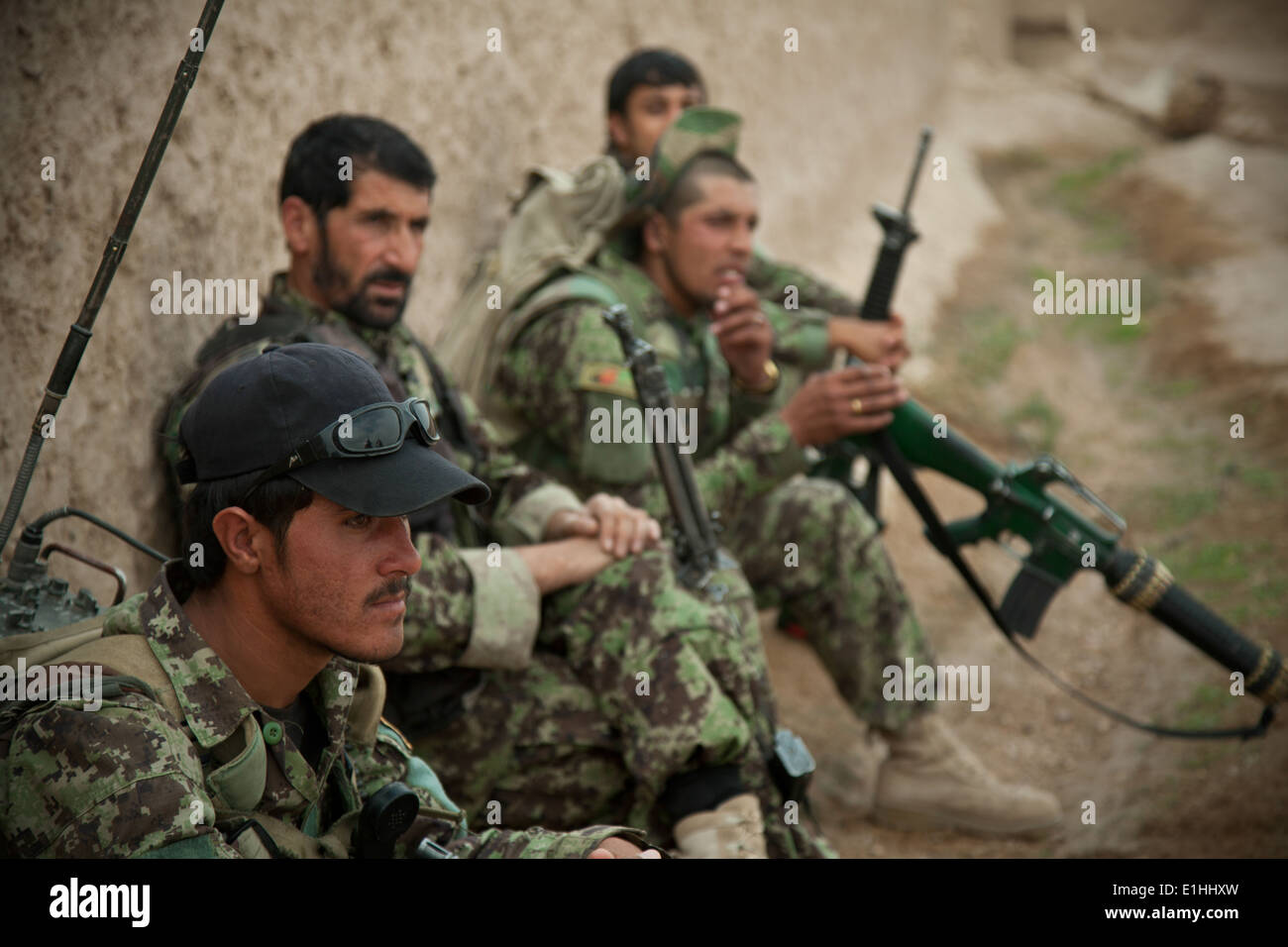 Afghan National Security Forces (ANSF) rest during a joint security ...