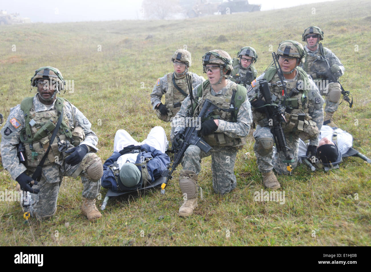 U.S. Army Soldiers from the 370th Engineer Company prepare to evacuate ...