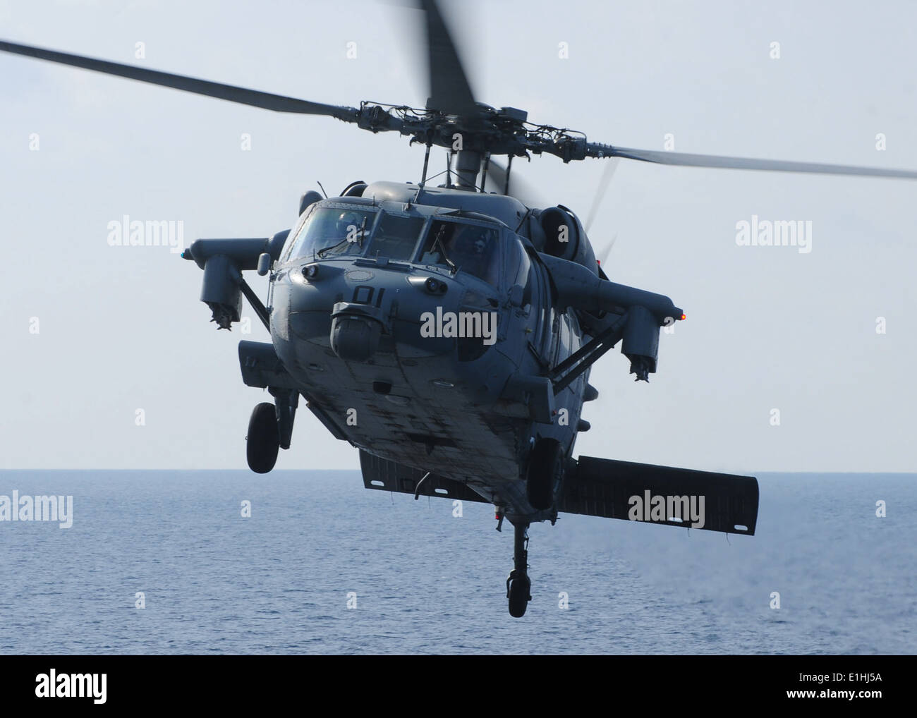 A U.S. Navy MH-60S Knighthawk helicopter assigned to Helicopter Sea ...
