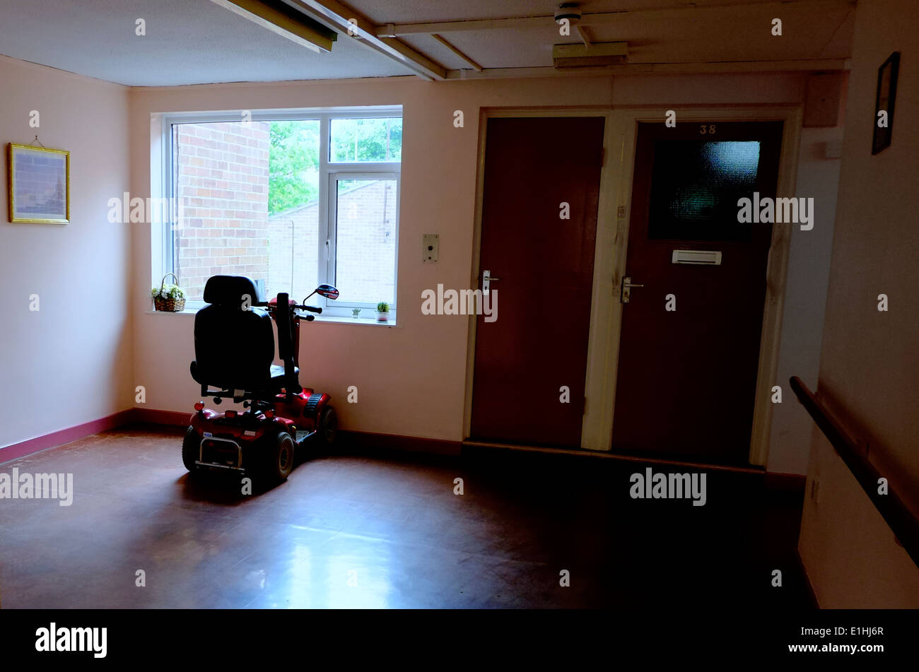 Electric scooter for the elderly inside a residential warden aided flat ...