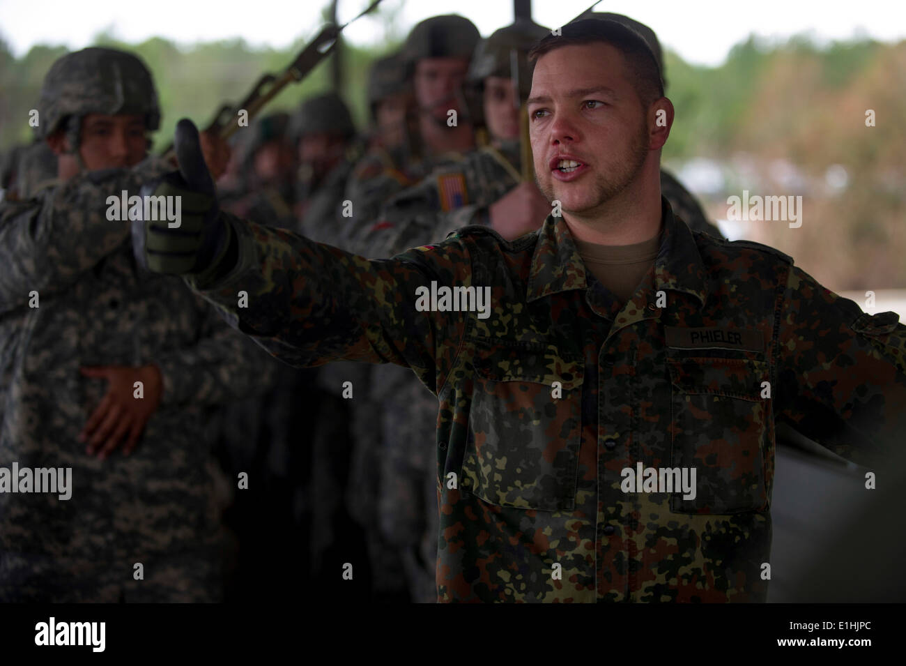 A Germany army jumpmaster, front, trains U.S. Soldiers on German ...