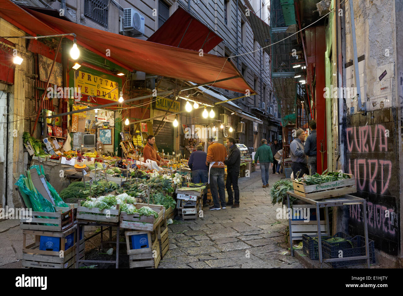Alleyway with market stalls, the oldest market in the historical centre ...