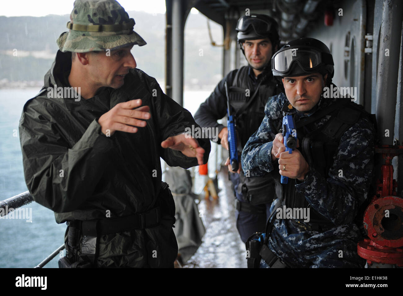 U.S. Navy Lt. Cmdr. Jose Gomez, right, and Hellenic navy Chief Petty ...