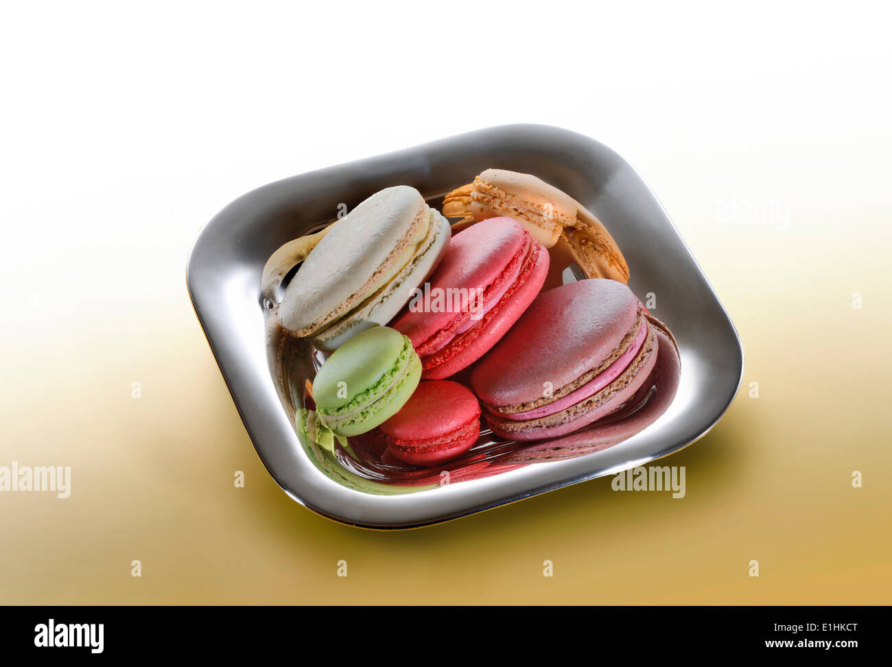 Macarons in a chrome dish Stock Photo - Alamy