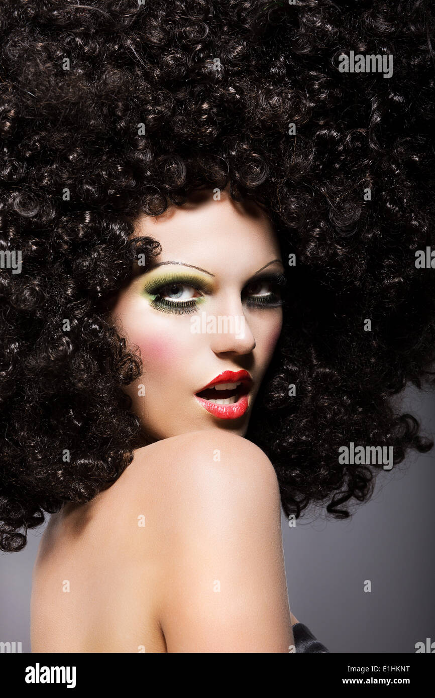 Haute Couture. Charisma. Trendy Woman with Creative Hairstyle Staring ...