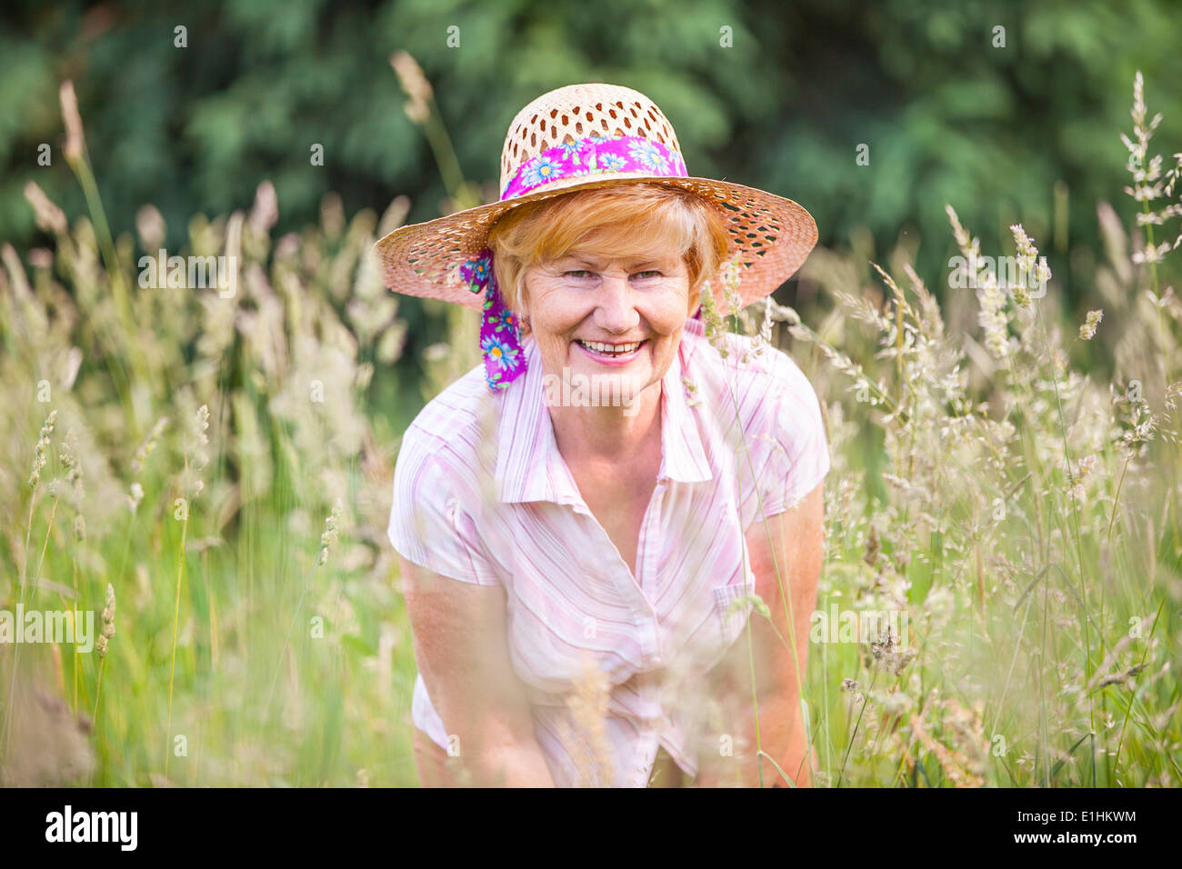 Positivity. Happy Senior Peasant Woman in Meadow smiling. Mature ...