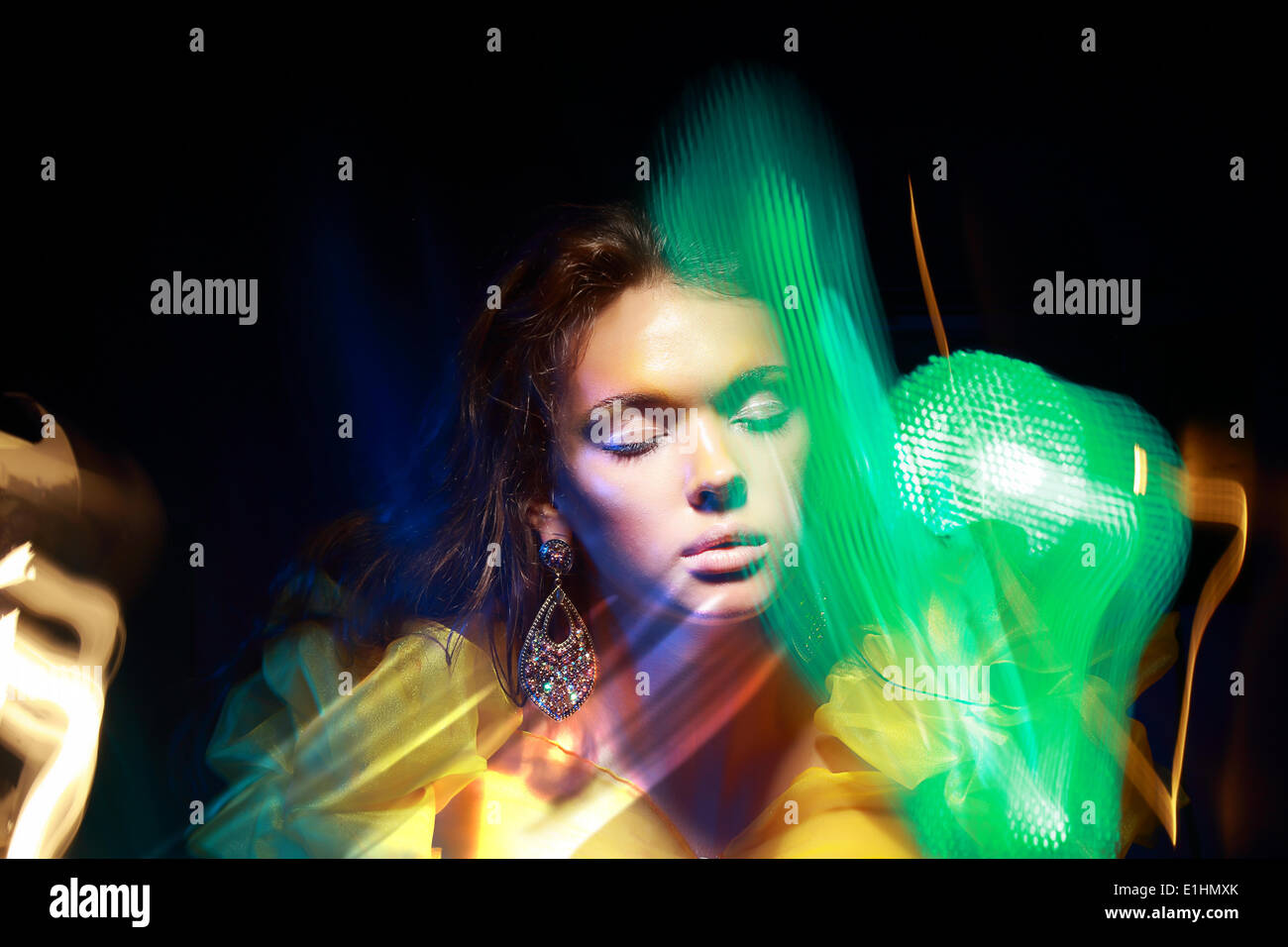 Flutter. Face of Woman in Blurry Colorful Lights. Metamorphose Stock ...