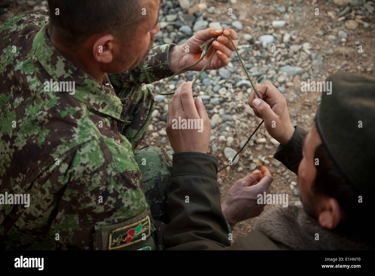 Afghan National Army soldiers prepare rope during counter-improvised ...
