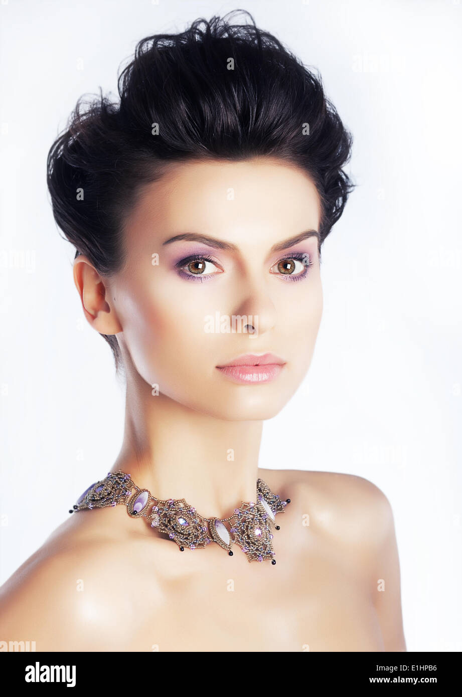 Beautiful model with natural make-up, clean skin on white background ...