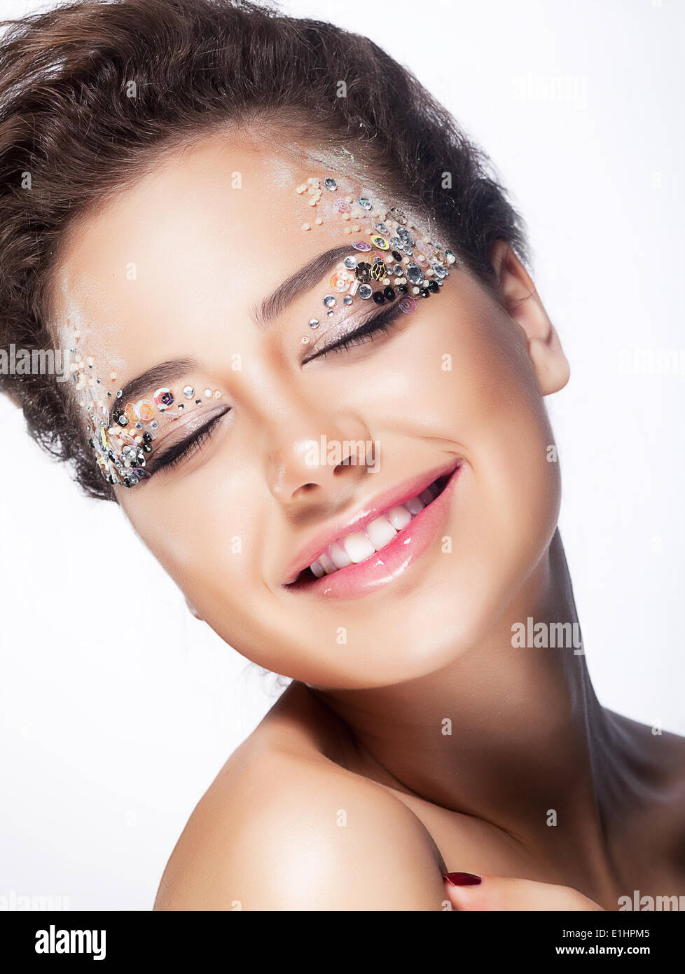 Elated young woman smiling with closed eyes - pleasure and bliss ...