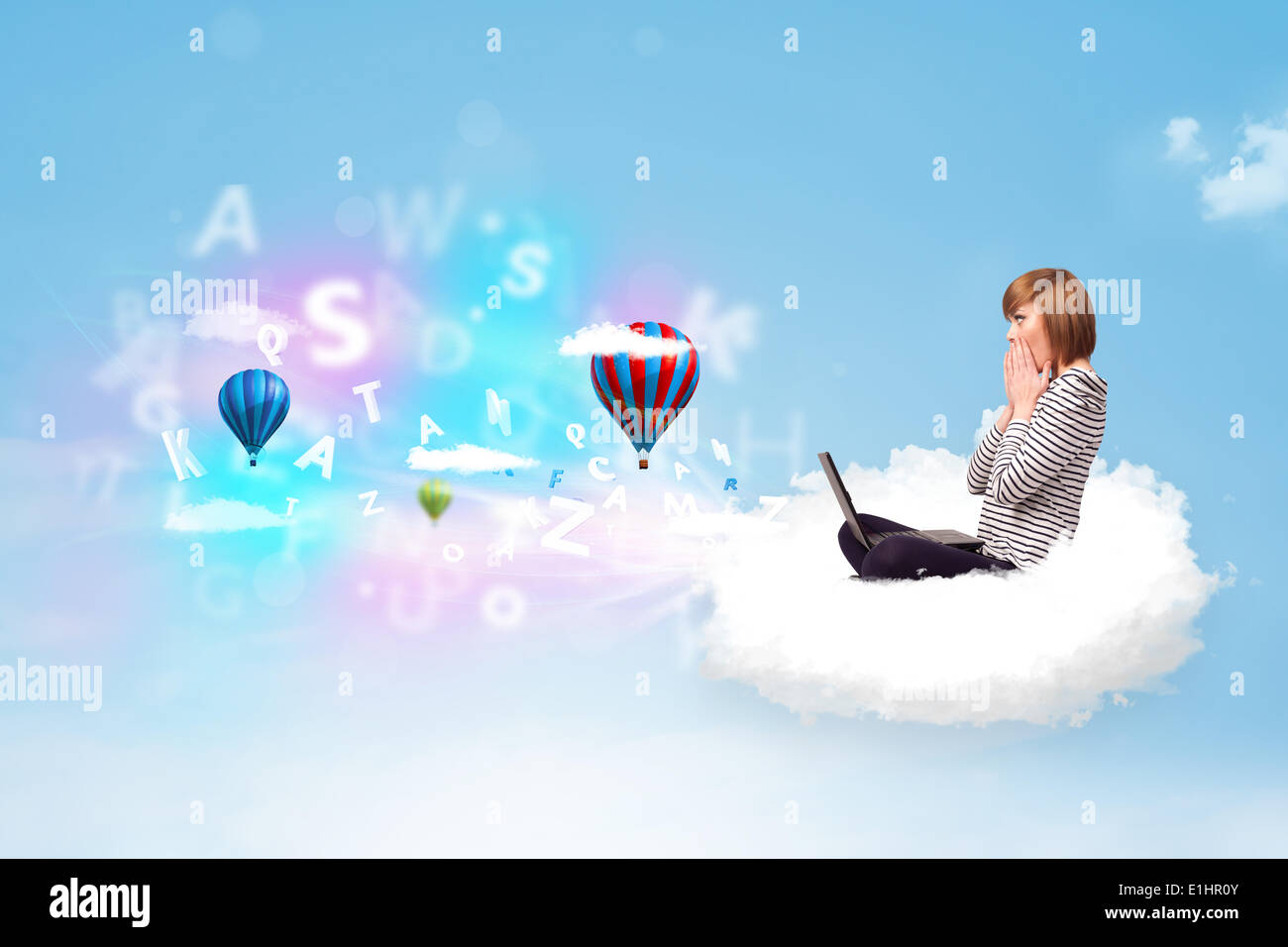 Young woman sitting in cloud with laptop Stock Photo - Alamy