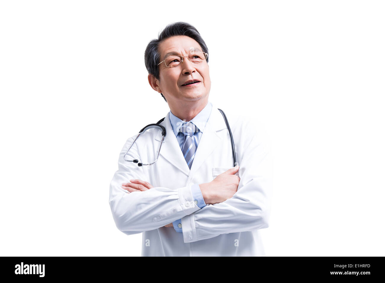 Male doctor arms crossed Stock Photo - Alamy