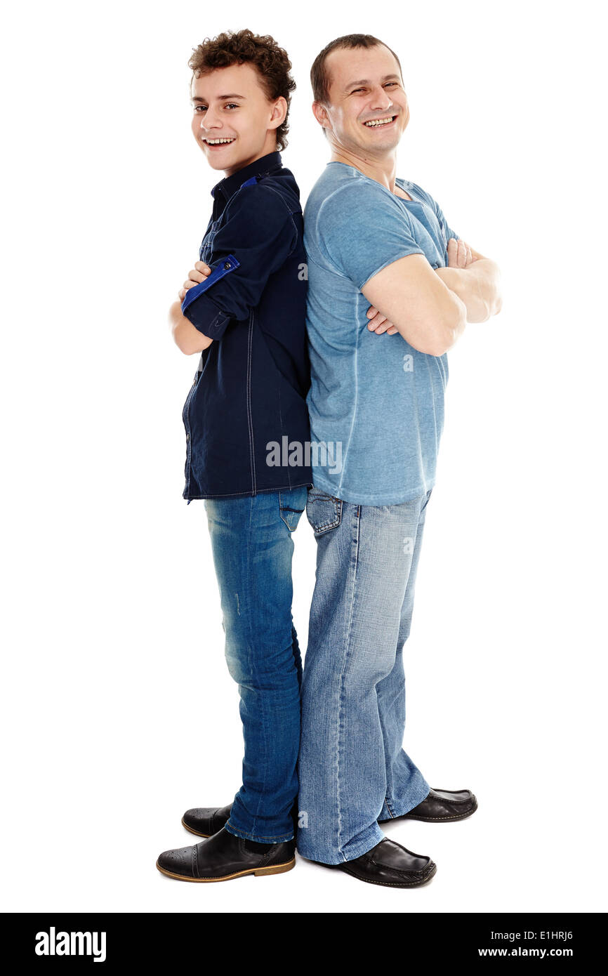 Father and son standing back to back isolated on white background, full ...