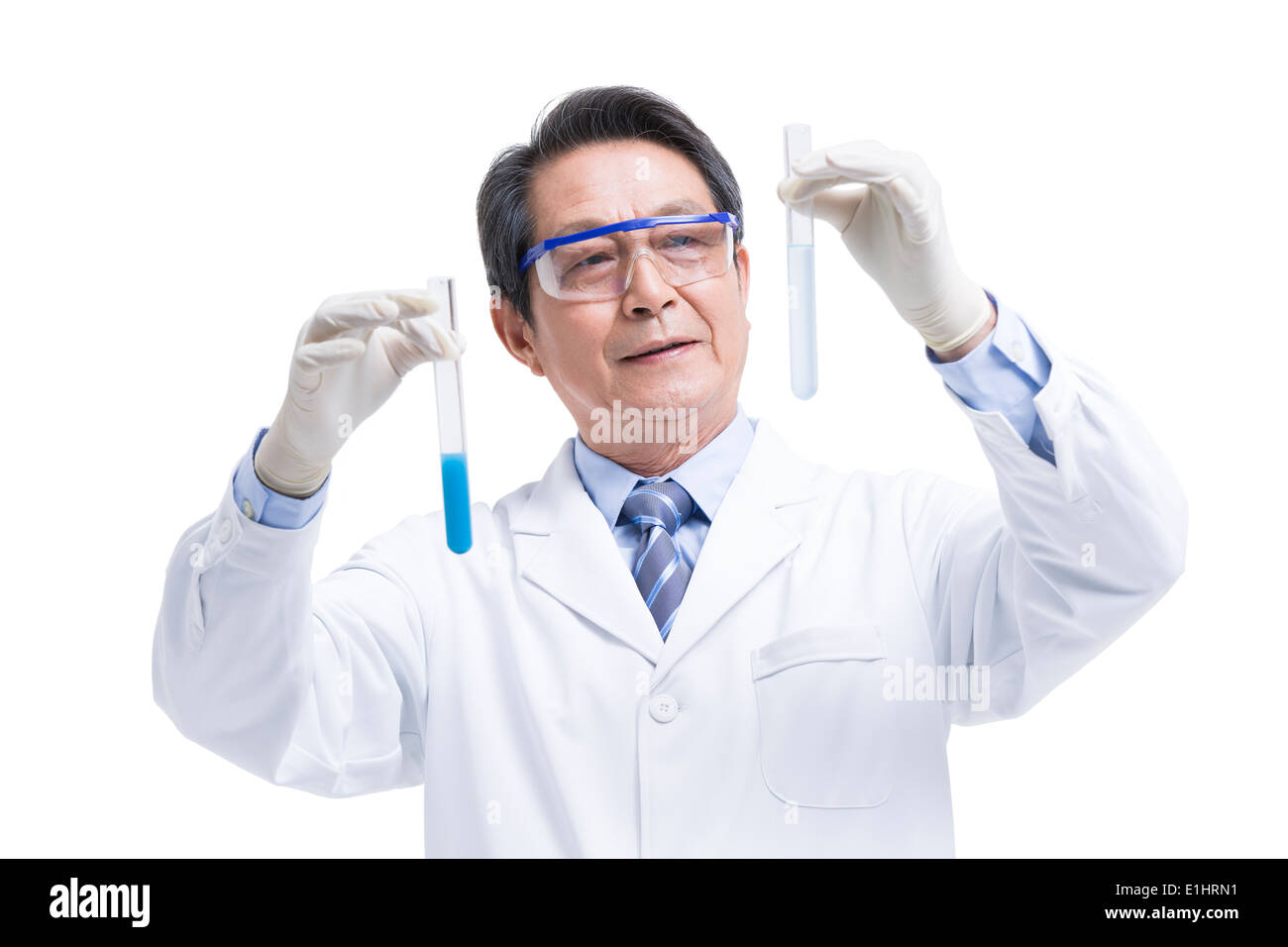 Senior scientist doing experiments Stock Photo - Alamy