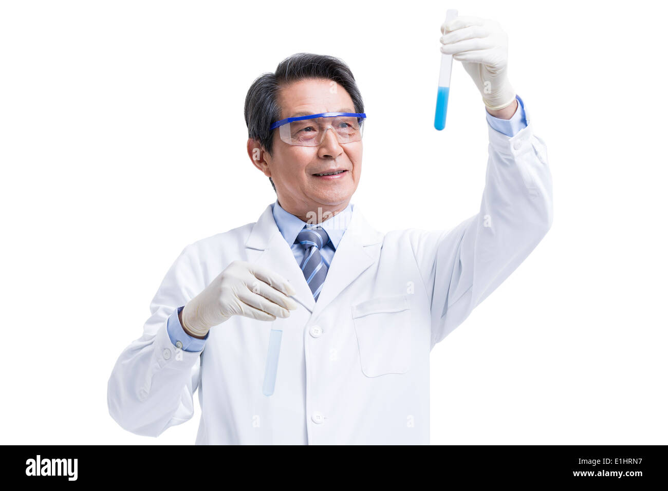 Senior scientist doing experiments Stock Photo - Alamy
