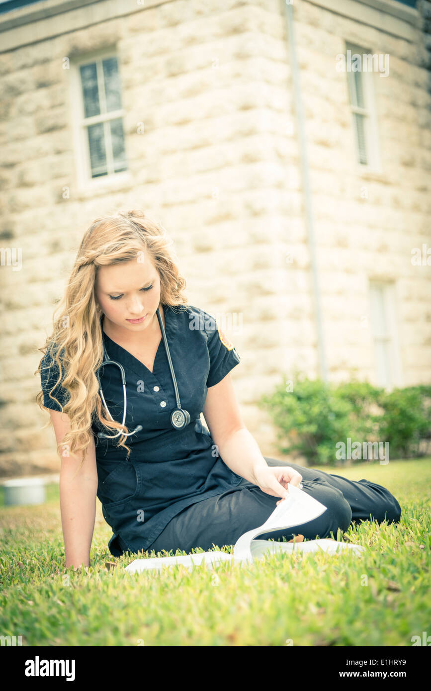 Portrait of young female nurse learning Stock Photo - Alamy