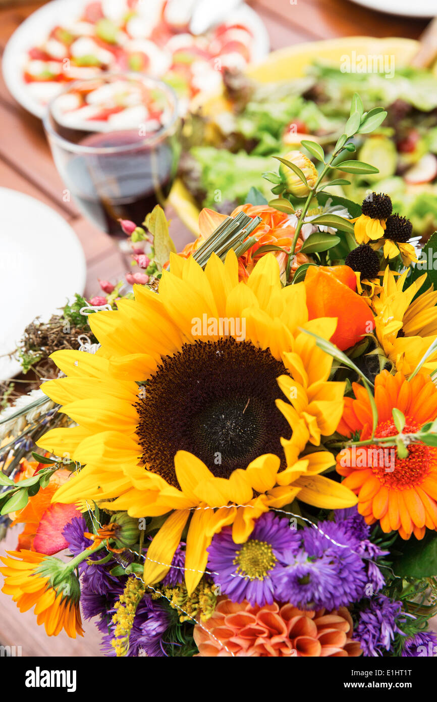 Bunch of flowers on garden table Stock Photo - Alamy