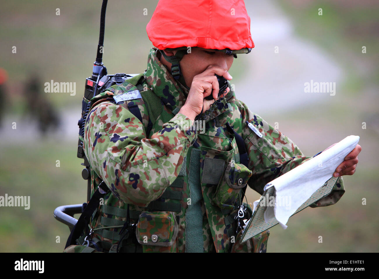 A Japan Ground Self-Defense Force (JGSDF) soldier communicates during ... A Japan Ground Self-Defense Force (JGSDF) soldier communicates during ...