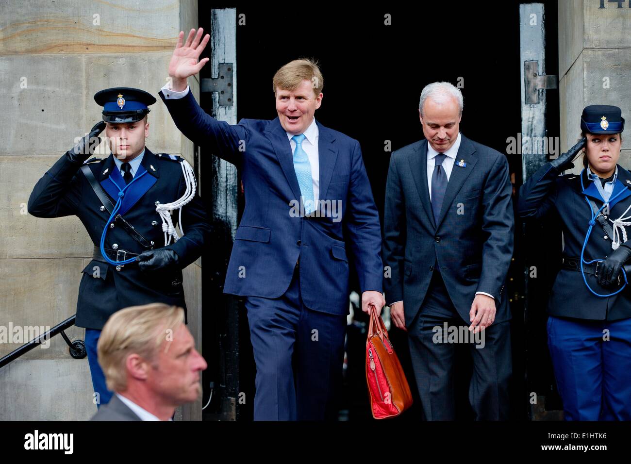 King Willem-Alexander (C) of the Netherlands attends a meeting with ...