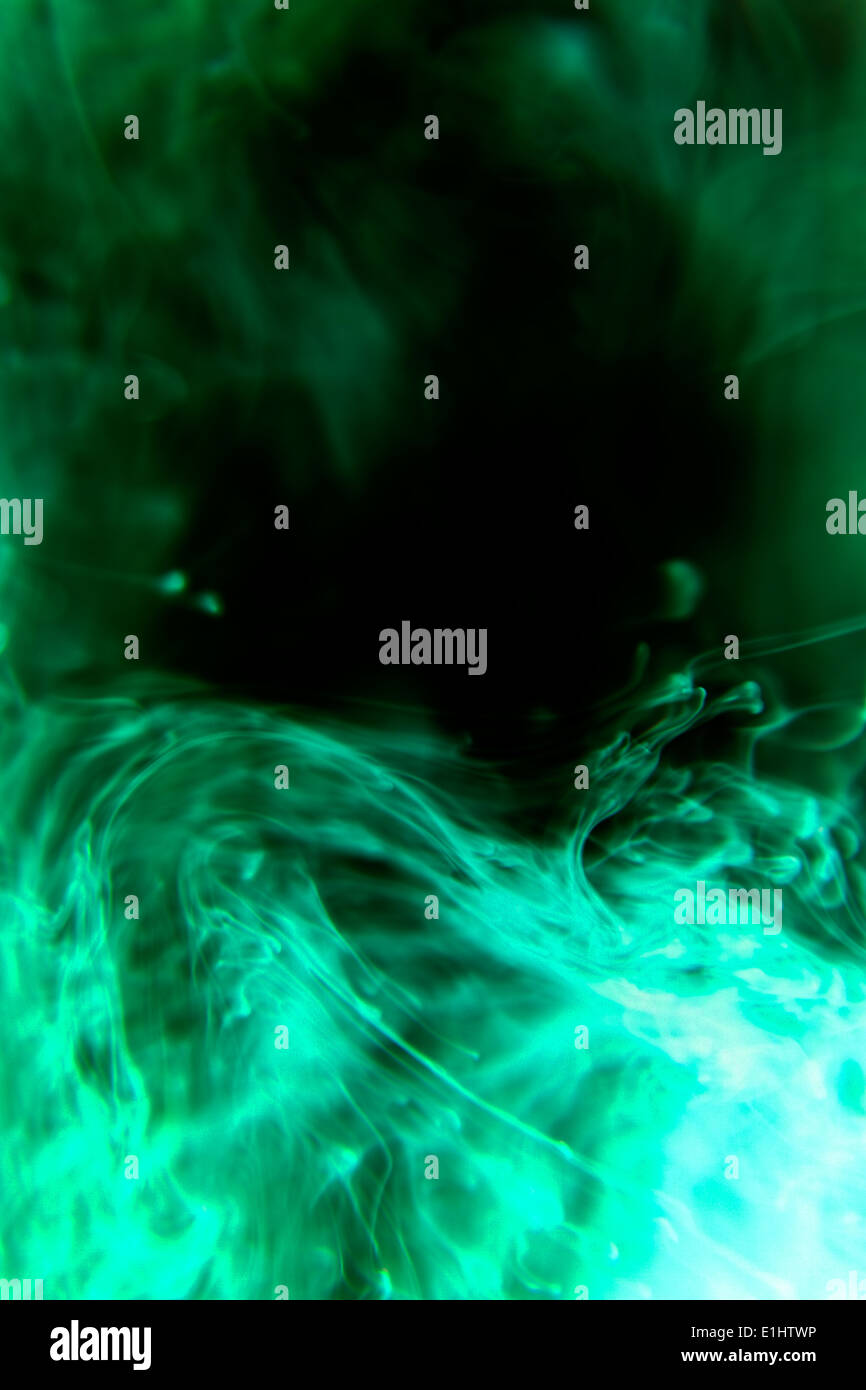 Ink in water green paint hi-res stock photography and images - Alamy