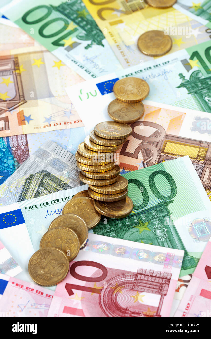 Euro notes and coins Stock Photo - Alamy