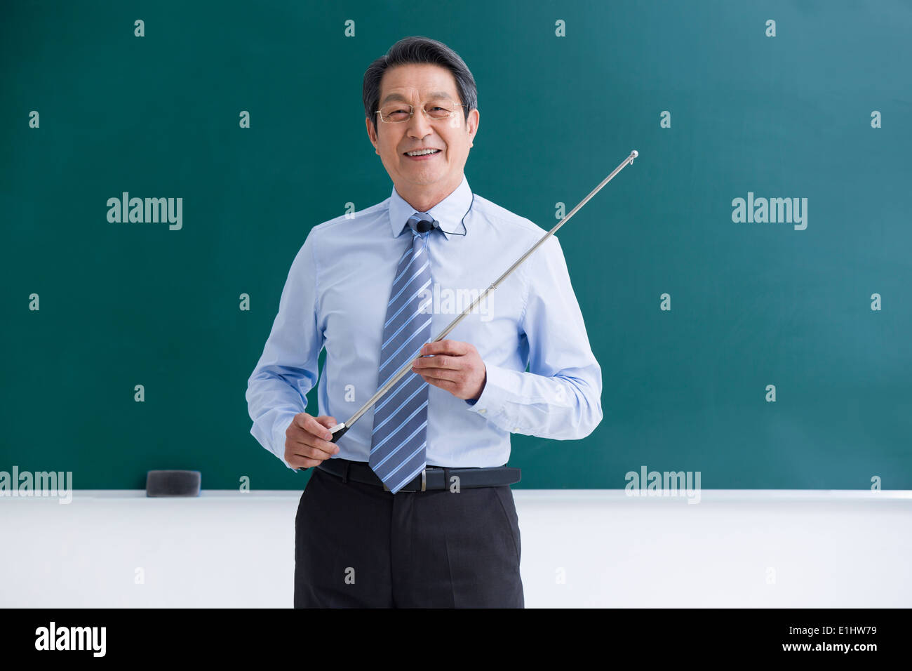 Professor teaching in classroom Stock Photo - Alamy