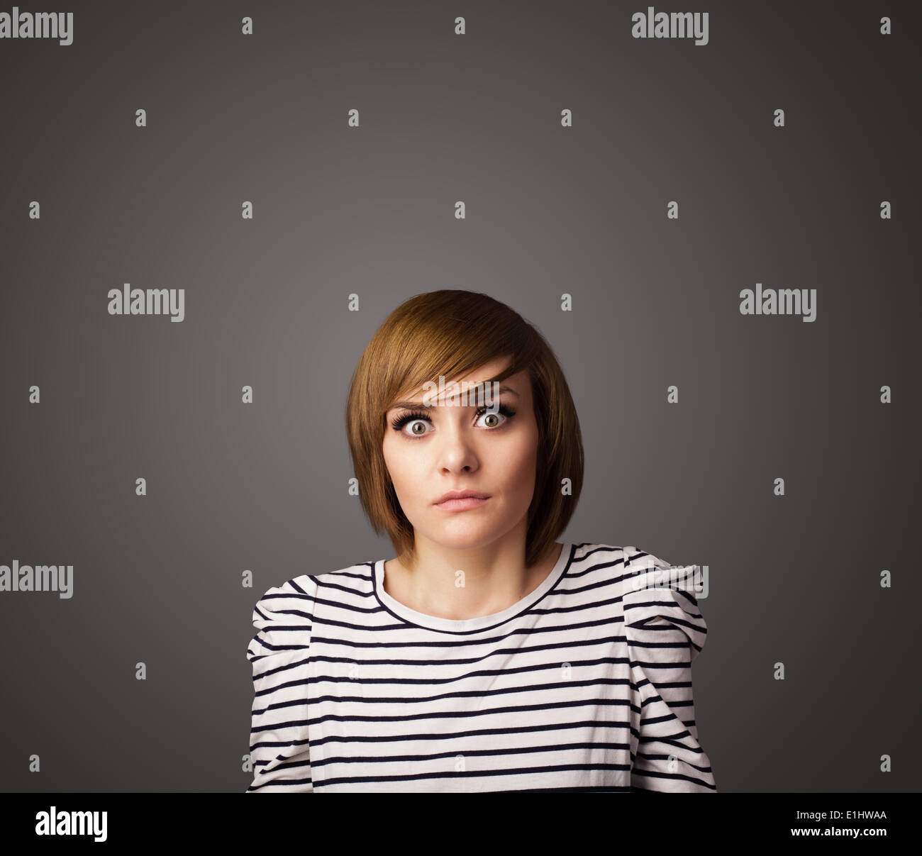Young woman thinking with copy space Stock Photo - Alamy