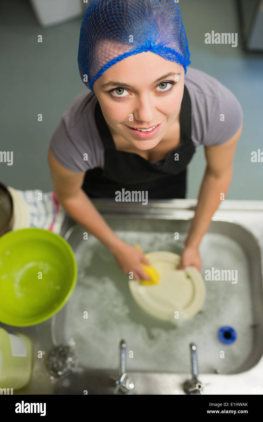 Woman washing up restaurant hi-res stock photography and images - Alamy