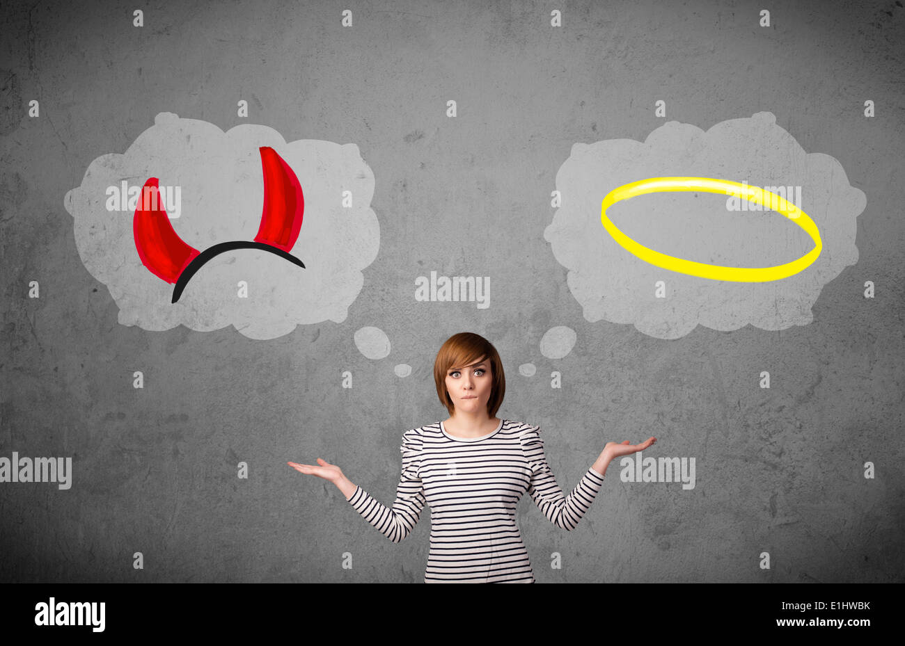 Woman choosing between good and bad Stock Photo - Alamy