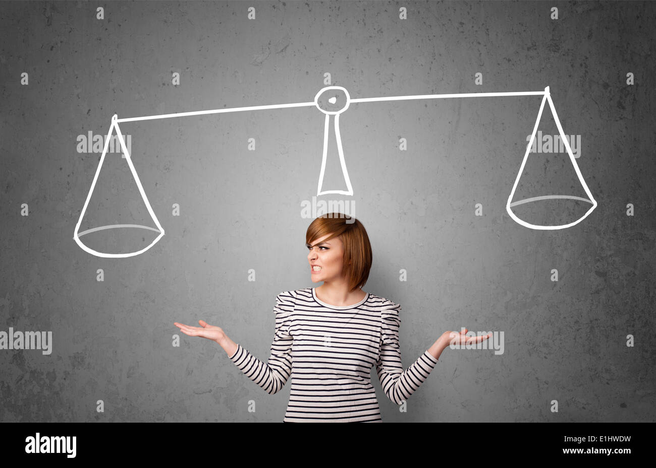Young woman taking a decision Stock Photo - Alamy