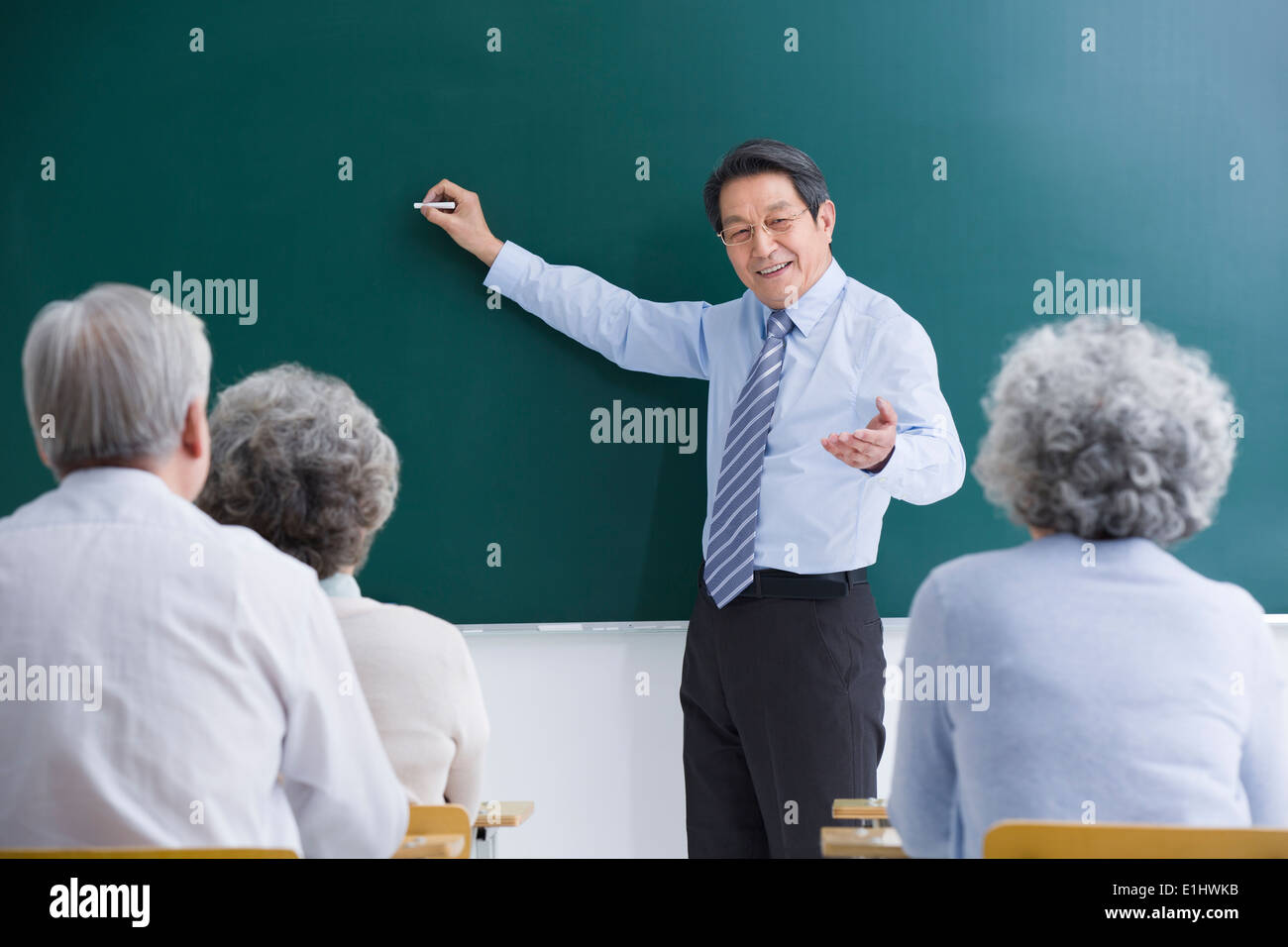Senior adults having class at school Stock Photo - Alamy