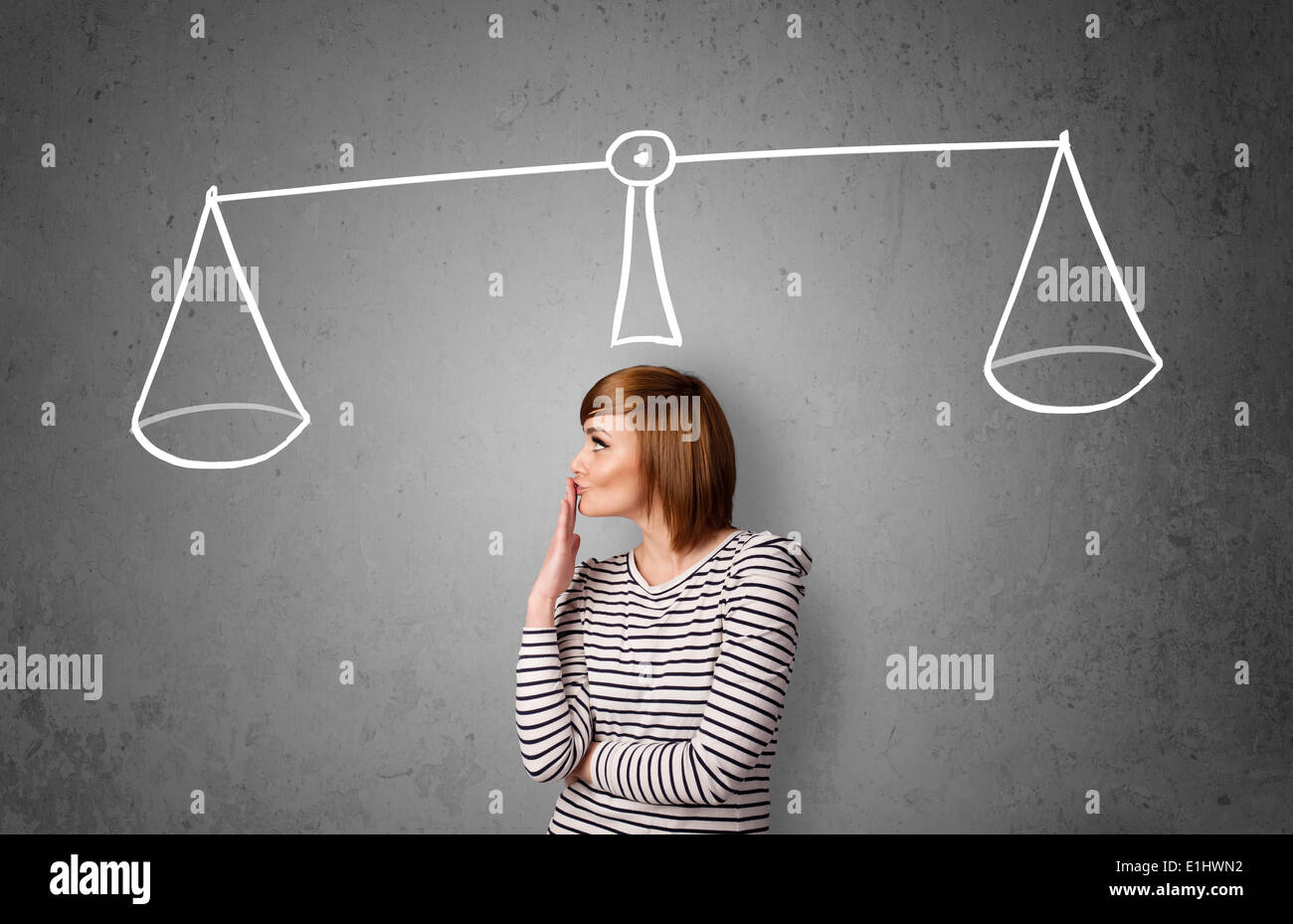 Young woman taking a decision Stock Photo - Alamy