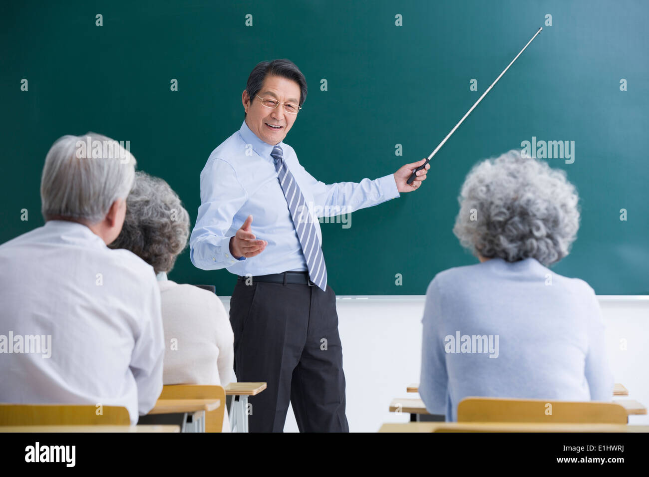 Senior adults having class at school Stock Photo - Alamy