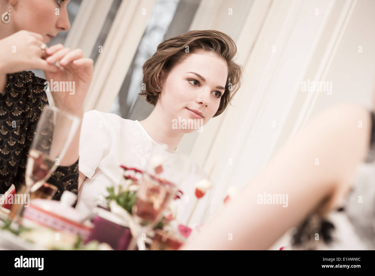 Young women on a retro style tea party Stock Photo - Alamy